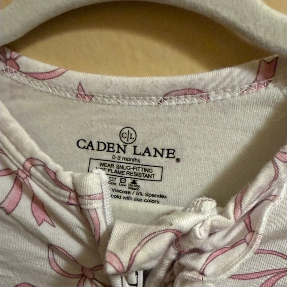 Caden Lane | One Pieces | Caden Lane Cream Footed Onepiece With Pink ...